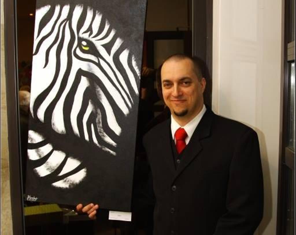 Bývalý kuchár Ján Suchý vystavuje svoje obrazy v bystrickej knižnici